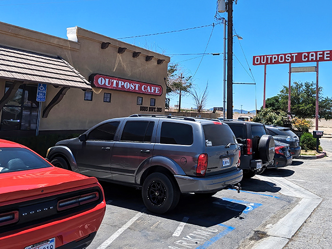 The unassuming exterior of Outpost Cafe stands like a desert mirage that actually delivers on its promise of culinary comfort.