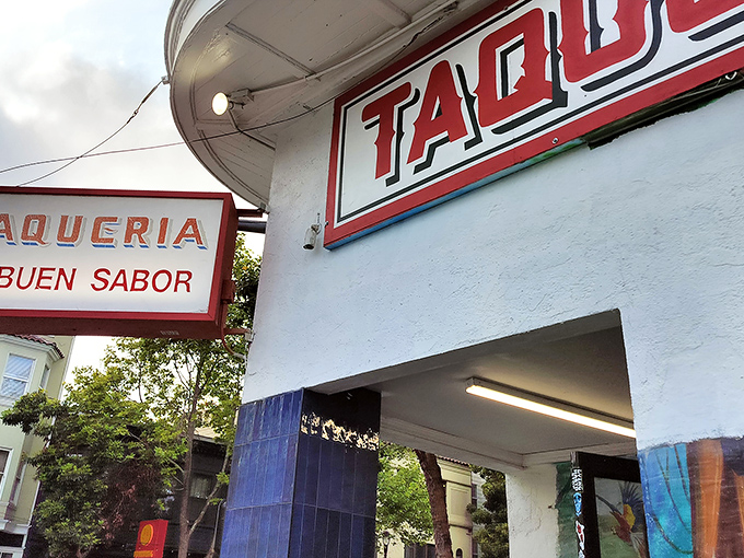 The iconic red "TACOS" sign beckons like a lighthouse for the hungry. No fancy frills needed when the food speaks this loudly.