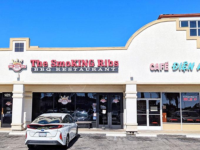 The unassuming storefront belies the smoky treasures within. Like finding a diamond in a strip mall, The Smoking Ribs' exterior promises authentic BBQ without pretension.