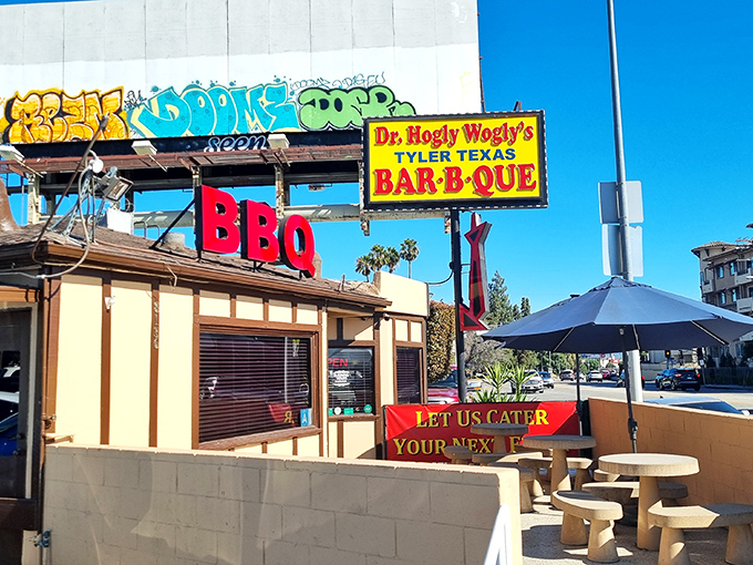That iconic sign beckons like a smoky siren call to BBQ lovers across the Valley. No fancy frills, just the promise of Texas-style meat magic.