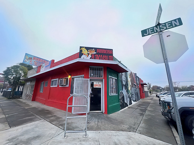 The unassuming corner building in red and green announces itself with no pretense&mdash;just the quiet confidence of a place that knows its birria speaks volumes.