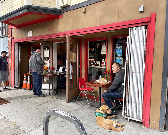 The unassuming storefront with its bright red trim houses sandwich greatness. Even the dogs know where the good stuff is!
