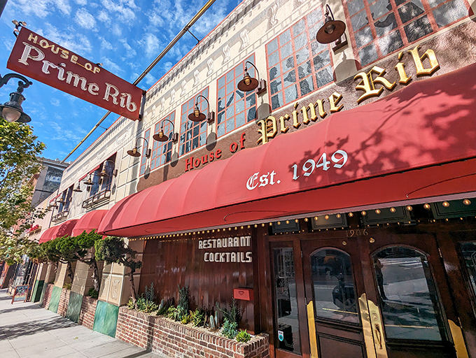 The iconic red awning of House of Prime Rib stands like a carnivore's North Star, guiding hungry San Franciscans to beefy bliss since 1949.