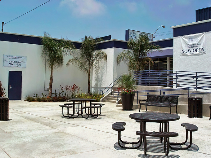 The blue-trimmed facade promises treasures within. "SHOP & SAVE" isn't just a slogan here&mdash;it's a guarantee that'll make your wallet do a happy dance.