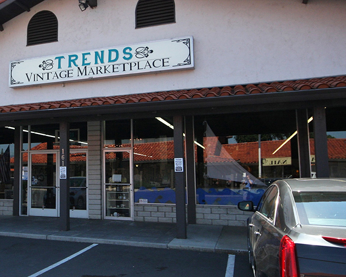 The unassuming exterior of Trends Vintage Marketplace hides a wonderland of treasures inside, like a book you can't judge by its cover.