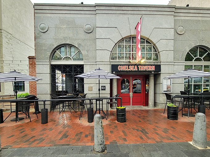The iconic red door of Chelsea Tavern beckons from Market Street, promising culinary adventures behind its historic stone fa&ccedil;ade.