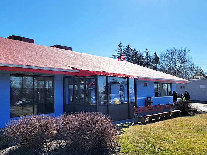The blue-and-red exterior stands like a culinary lighthouse in Wilmington, promising comfort and satisfaction with its no-nonsense diner charm.