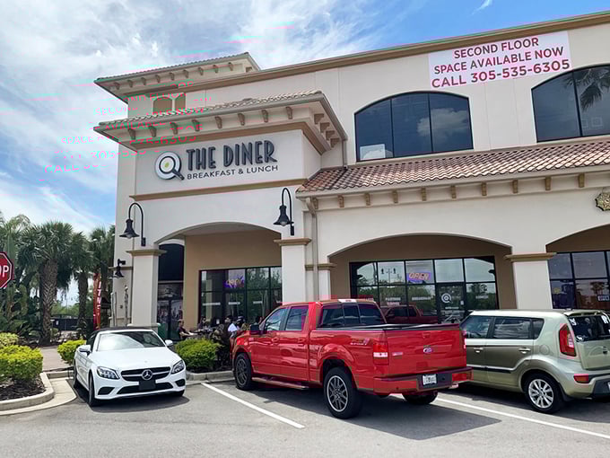 Mediterranean charm meets breakfast paradise at @ The Diner's exterior, where hungry patrons know that culinary magic awaits behind those doors.