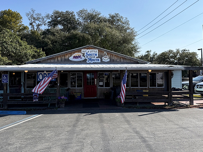 The weathered wood and bright red door say "authentic Southern cooking lives here." That sign promising "a little South in your mouth" isn't kidding!