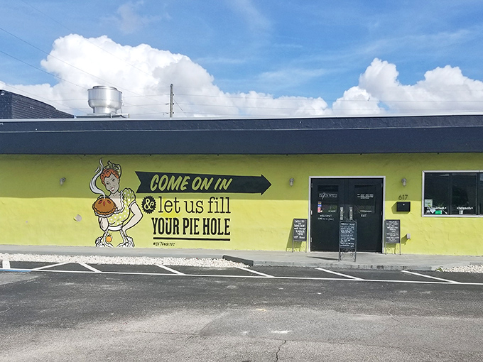 That cheerful mural promises pie-hole satisfaction, and trust me, this place absolutely delivers on every delicious word.