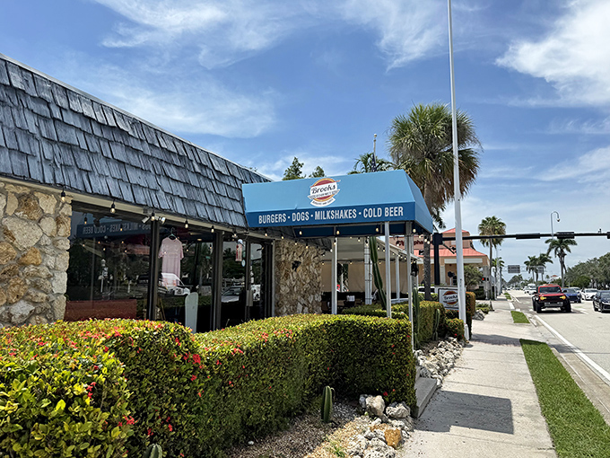 The unassuming exterior of Brooks Burgers in Naples hides culinary treasures within, like finding a diamond in your backyard.
