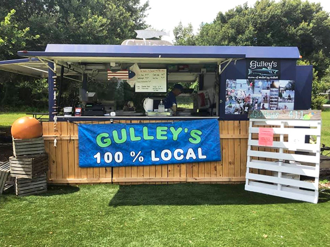 The blue seafood stand that proves paradise doesn't need a dress code. Gulley's unassuming exterior houses seafood treasures that would make Neptune himself swim ashore.