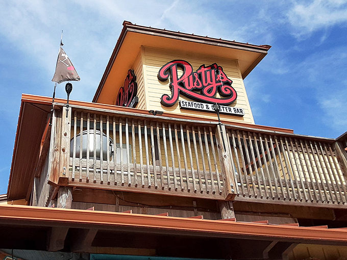 Rusty's stands proud against the Florida sky, its weathered wood and bright signage promising seafood treasures within. The perfect coastal hideaway.