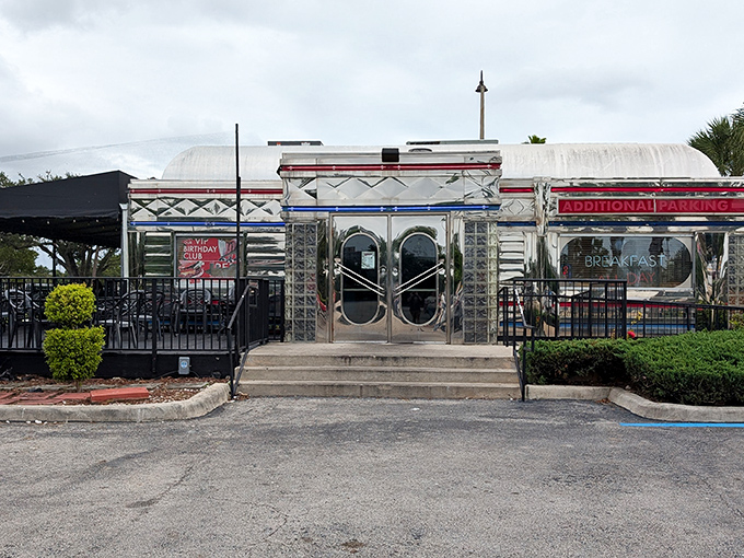 Chrome gleaming in the Florida sunshine, Moonlite Diner's exterior promises a time-traveling feast. This isn't just a restaurant&mdash;it's a shiny portal to simpler times. 