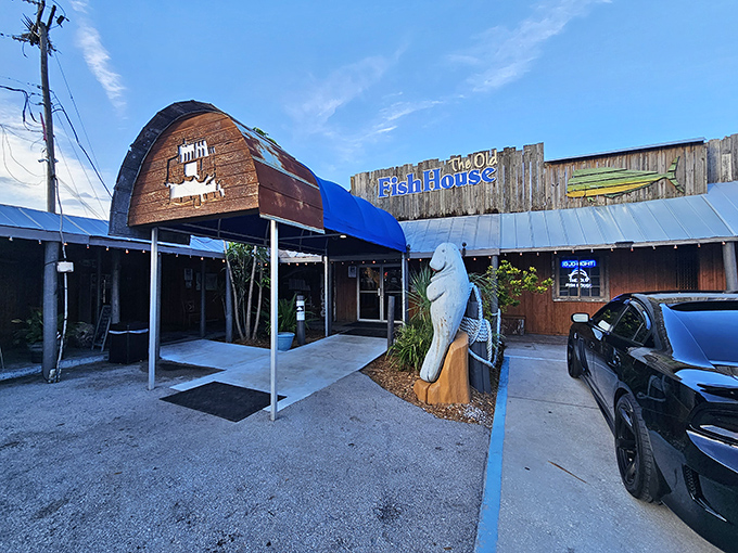 That weathered wooden charm whispers "authentic seafood paradise" before you even step inside this coastal treasure.