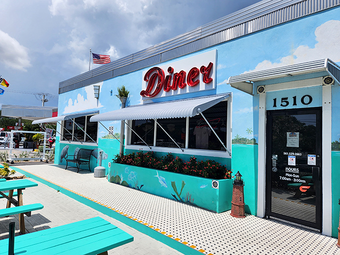 The turquoise beacon of breakfast bliss! Lighthouse Diner's vibrant exterior promises coastal charm and comfort food that's worth the morning pilgrimage.