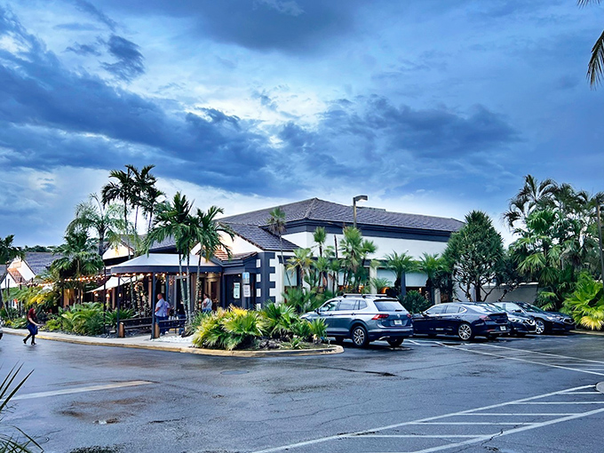 Tropical paradise or seafood haven? At Bimini Twist, palm trees and twinkling lights create the perfect backdrop for an unforgettable Florida evening.