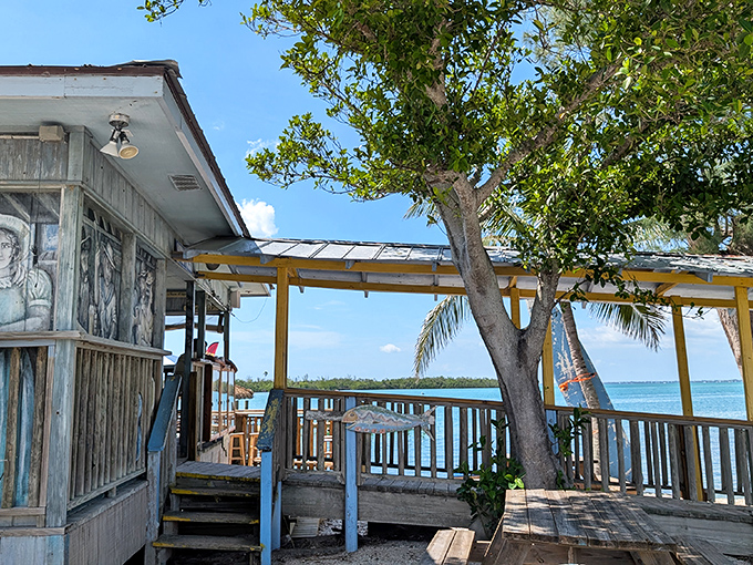 The weathered charm of New Pass Grill speaks volumes before you even taste the food. Old Florida perfection perched right on the water's edge.