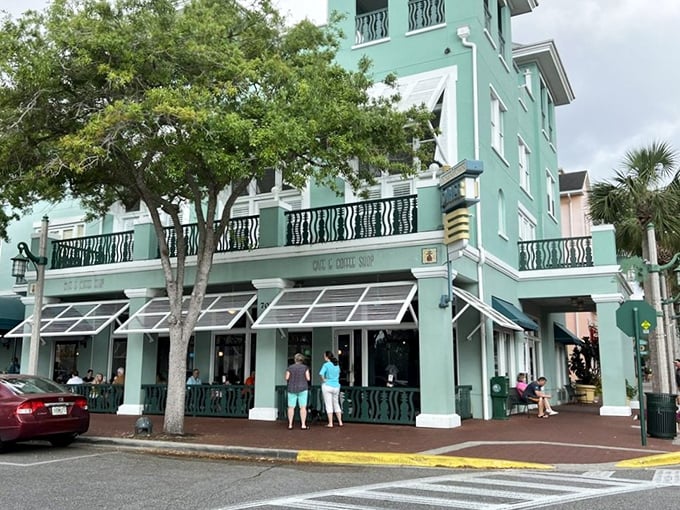 The mint-green facade of Downtown Diner stands like a beacon of breakfast hope in Celebration's picturesque downtown. Those brick sidewalks lead to pancake paradise.