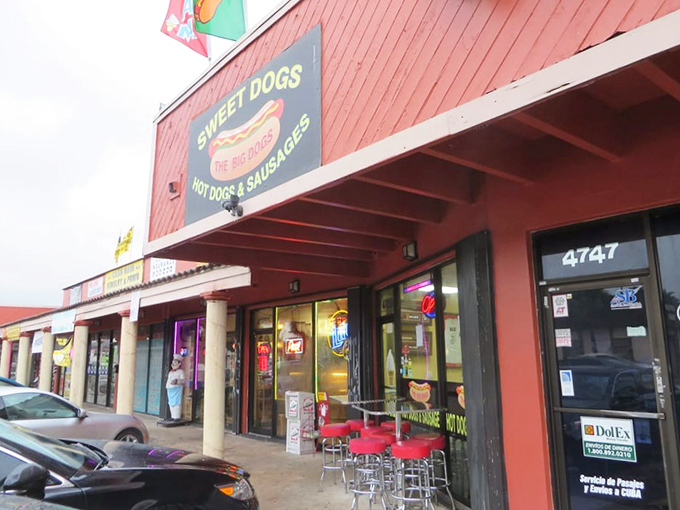 The coral-colored beacon of hot dog heaven stands proudly on a Miami street, promising frankfurter fantasies that'll make your taste buds do the salsa.