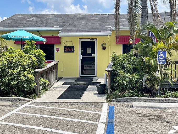 The cheerful yellow exterior with red shutters beckons like a breakfast lighthouse in Alva. Palm trees and a welcoming ramp complete this unassuming culinary gem.