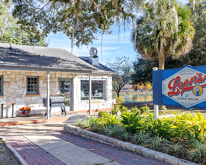 Stone cottage charm meets lakeside serenity at Leon's, where Spanish moss and Florida sunshine create the perfect backdrop for culinary magic.