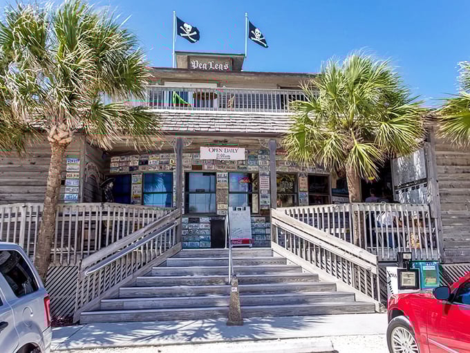 Pirate flags flying high above this weathered wooden treasure chest of a restaurant. The stairway practically beckons "Ahoy, hungry mateys!"
