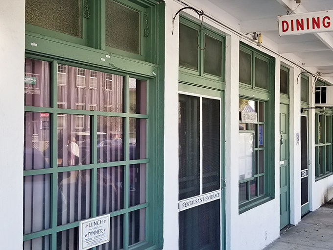 The unassuming entrance to Temptation Restaurant might fool you, but locals know this modest doorway leads to seafood paradise.