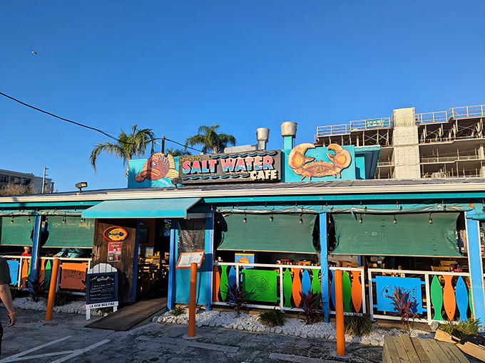 The technicolor dreamcoat of seafood shacks! Frenchy's exterior bursts with Caribbean flair, promising a Florida experience that's anything but beige.
