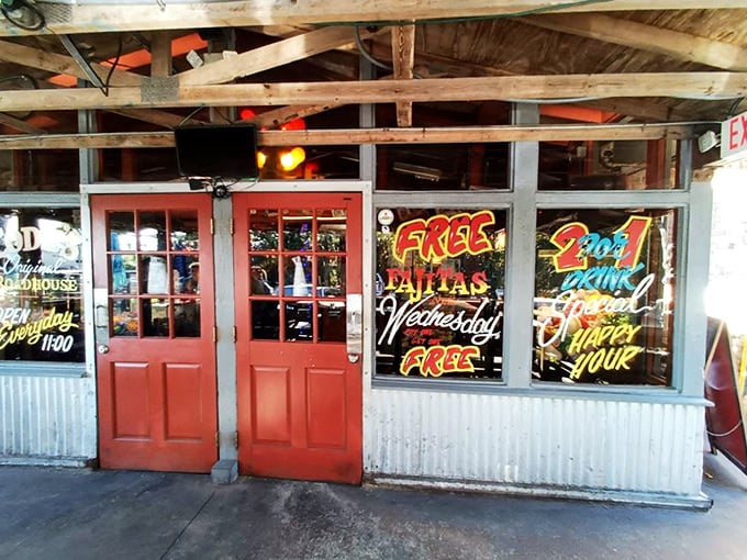 The classic roadhouse exterior beckons with its vintage sign and sunny yellow patio wall&mdash;Florida's answer to "come as you are, leave happier than you arrived."