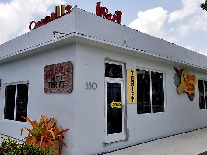 The neon-bright sign of Oddballs Nifty Thrift beckons treasure hunters with its retro charm and promise of vintage wonders within.