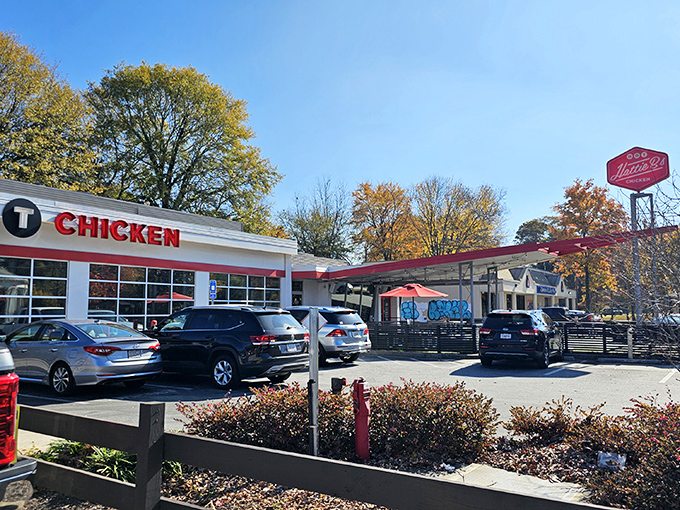 The bold red "HOT CHICKEN" sign isn't just advertising&mdash;it's a warning and a promise. This unassuming building houses flavor explosions waiting to happen.