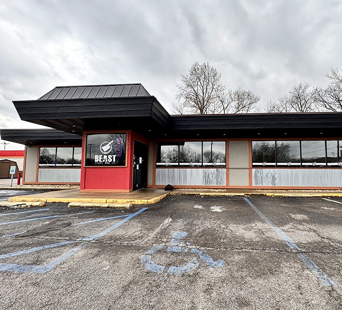 The unassuming exterior hides barbecue greatness like Clark Kent's glasses hide Superman. Red accents hint at the flavor explosions waiting inside.