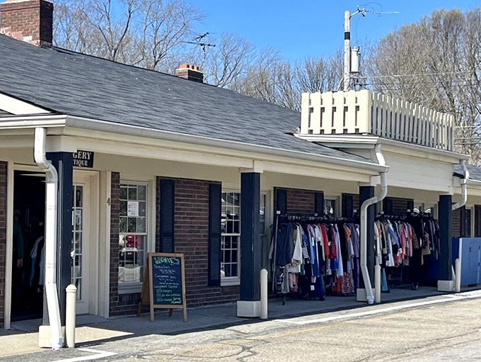 The brick-and-mortar equivalent of finding twenty bucks in your winter coat pocket. The Toggery's exterior promises treasure hunting with clothes already spilling onto the porch.