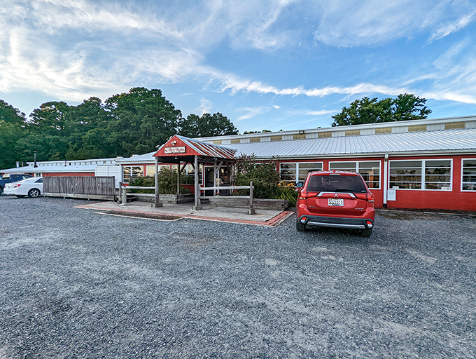 The bright red exterior of The Red Roost stands out against the Maryland sky like a beacon calling hungry travelers home.