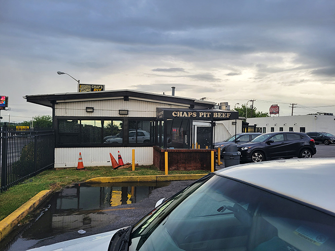 The unassuming exterior of Chaps Pit Beef stands like a meat beacon in Baltimore. No frills, just thrills for your taste buds await inside.