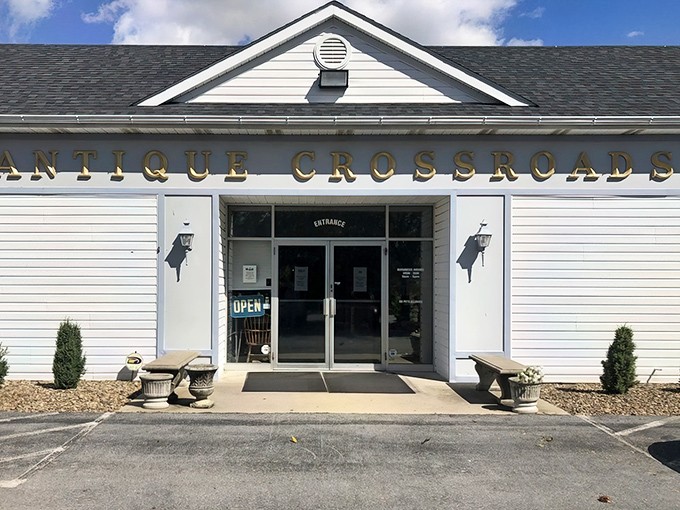 The unassuming white exterior of Antique Crossroads belies the wonderland within&mdash;like finding Narnia in a suburban strip mall.