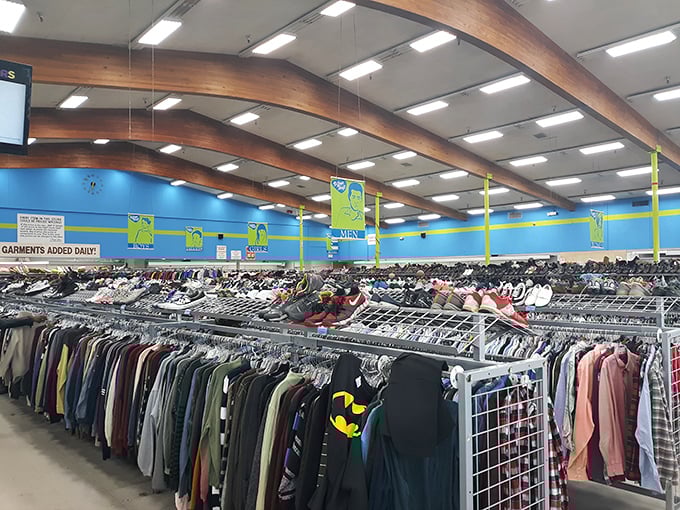The bright blue trim of Village Thrift beckons like a siren call to bargain hunters.
