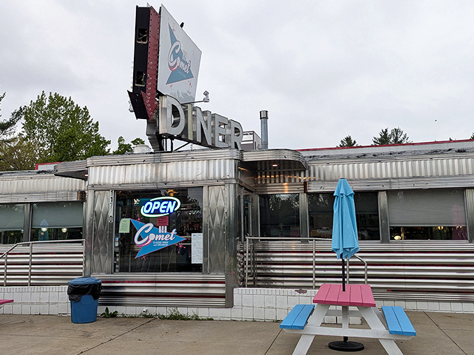 The gleaming stainless steel exterior of The Comet isn't just a diner&mdash;it's a time machine with a milkshake menu. Pure mid-century magic.