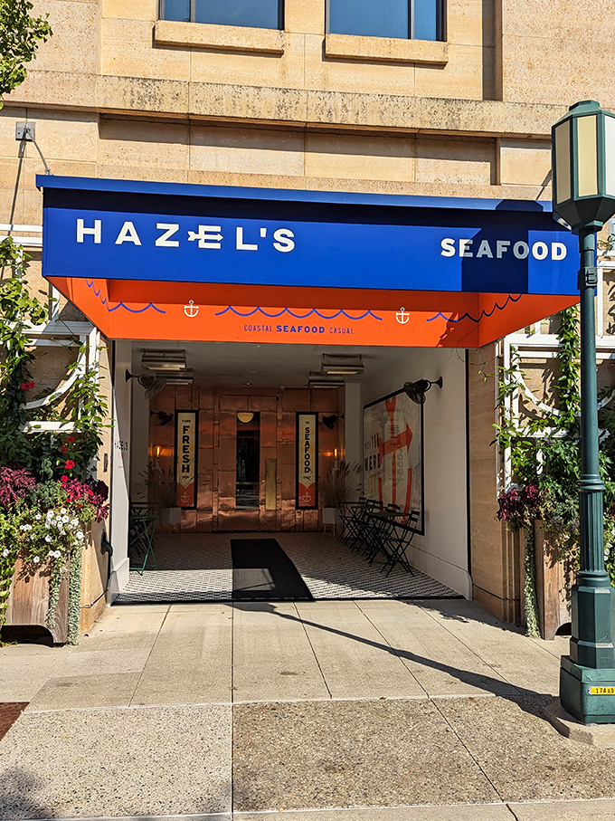 The blue awning of Hazel's stands out like a maritime beacon on Birmingham's streets, promising seafood treasures for landlocked Michiganders.