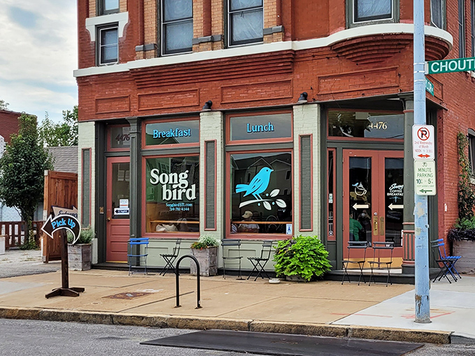 The historic brick building with its distinctive turret stands as a beacon for breakfast lovers in The Grove neighborhood.