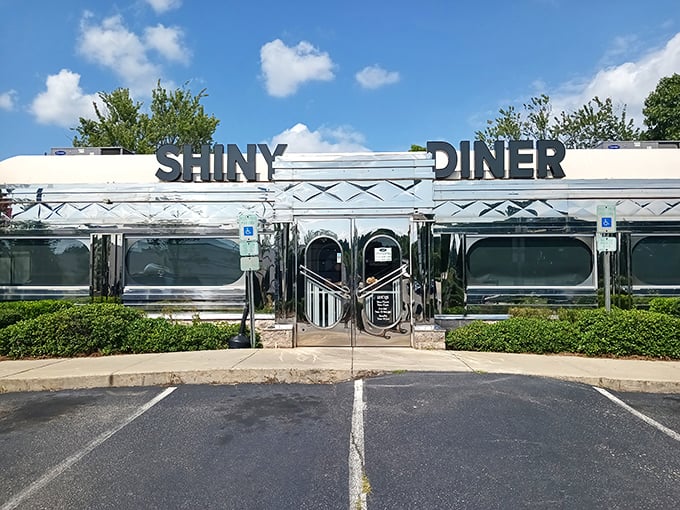 Like a chrome time machine parked on Buck Jones Road, The Shiny Diner's gleaming exterior promises nostalgic delights before you even step inside. 