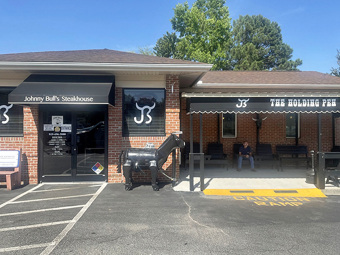 The unassuming brick exterior hides culinary greatness like Clark Kent's glasses hide Superman. That metal bull knows what's up. 