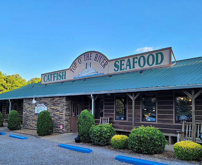 The humble exterior of Top O' The River belies the culinary treasures within. That green roof has become a beacon for seafood lovers across state lines.