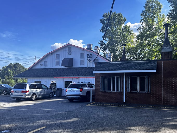 The unassuming building with its brick facade stands like a barbecue beacon, promising smoky delights within its humble walls.