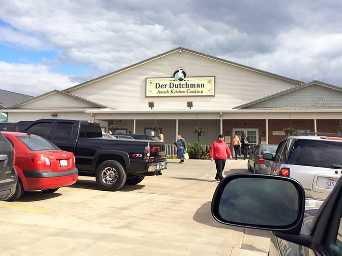 The unassuming exterior of Der Dutchman belies the culinary treasures within. Like finding a Michelin star restaurant disguised as your favorite aunt's house.