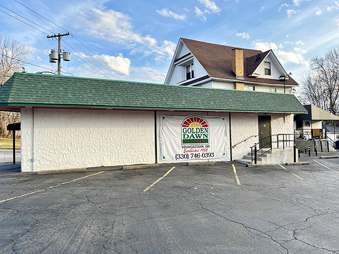 The unassuming exterior of Golden Dawn hides culinary treasures within—proof that you should never judge a restaurant by its façade.