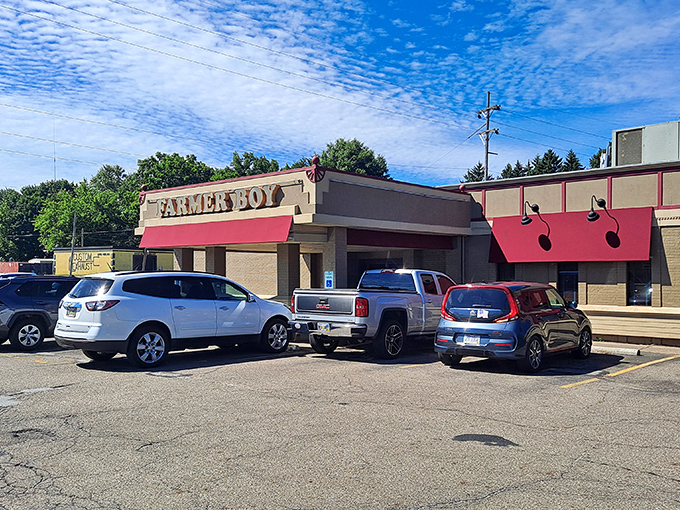 The unassuming exterior of Farmer Boy beckons with its red awnings and simple signage &ndash; culinary treasures don't always wear fancy packaging.
