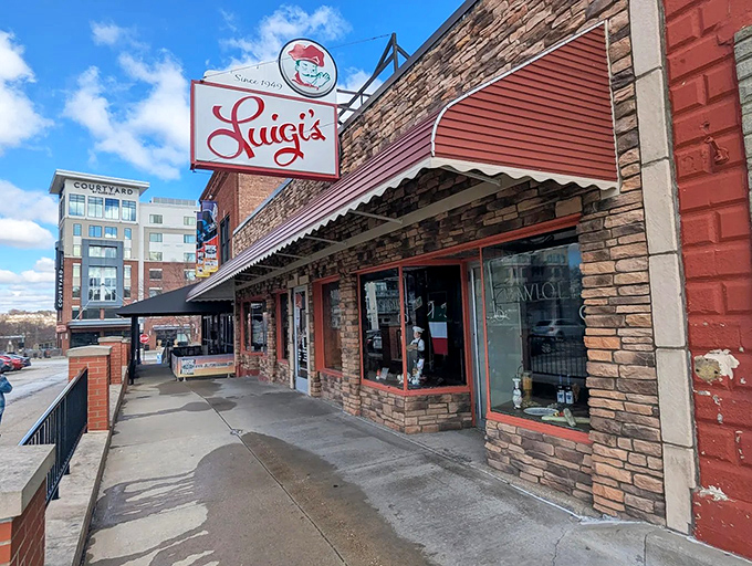 The iconic red and white sign beckons like an old friend. Luigi's has been holding court on this Akron corner since before many of us had our first pizza epiphany.