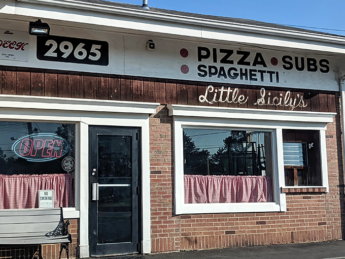 The unassuming brick fa&ccedil;ade of Little Sicily's might not stop traffic, but locals know this modest storefront houses pizza treasures worth slamming on the brakes for.